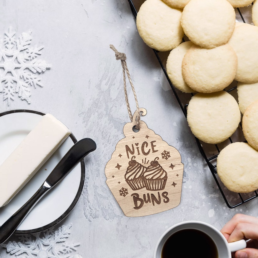 Add humor to your holiday decor with our "Nice Buns" Christmas bauble ...